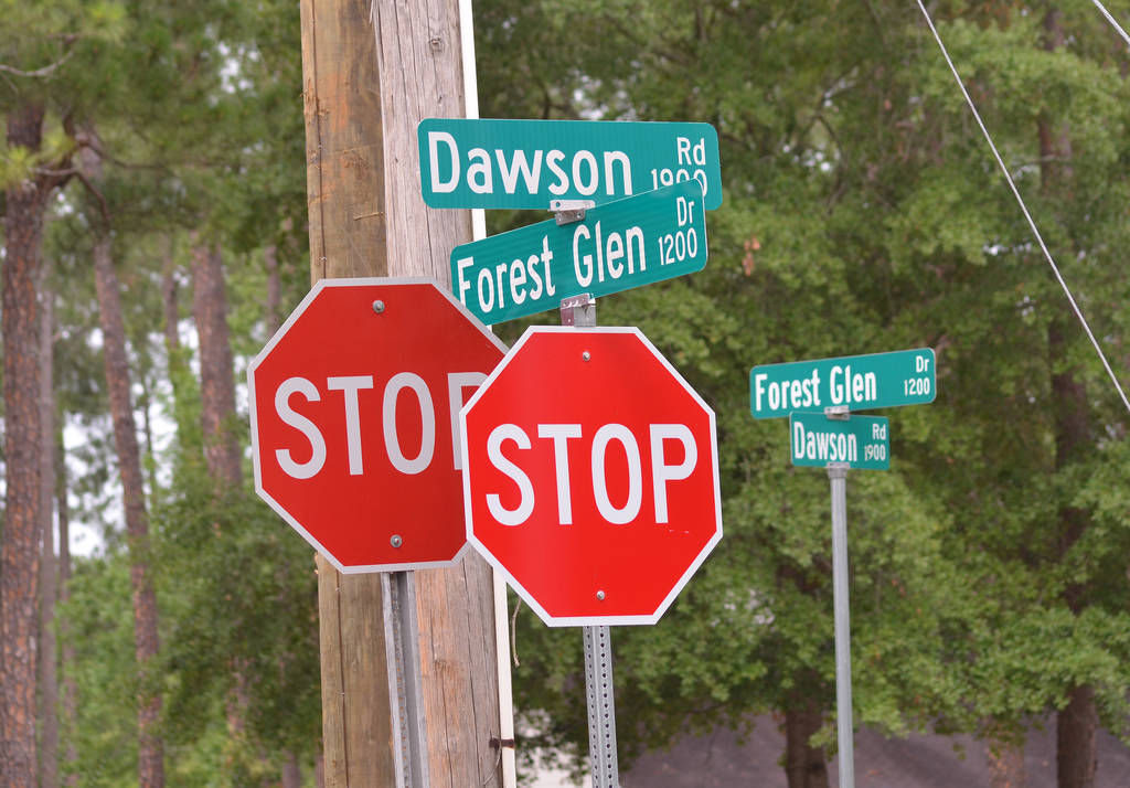 Duplicate street signs line Dawson Road in Albany – Albany Herald