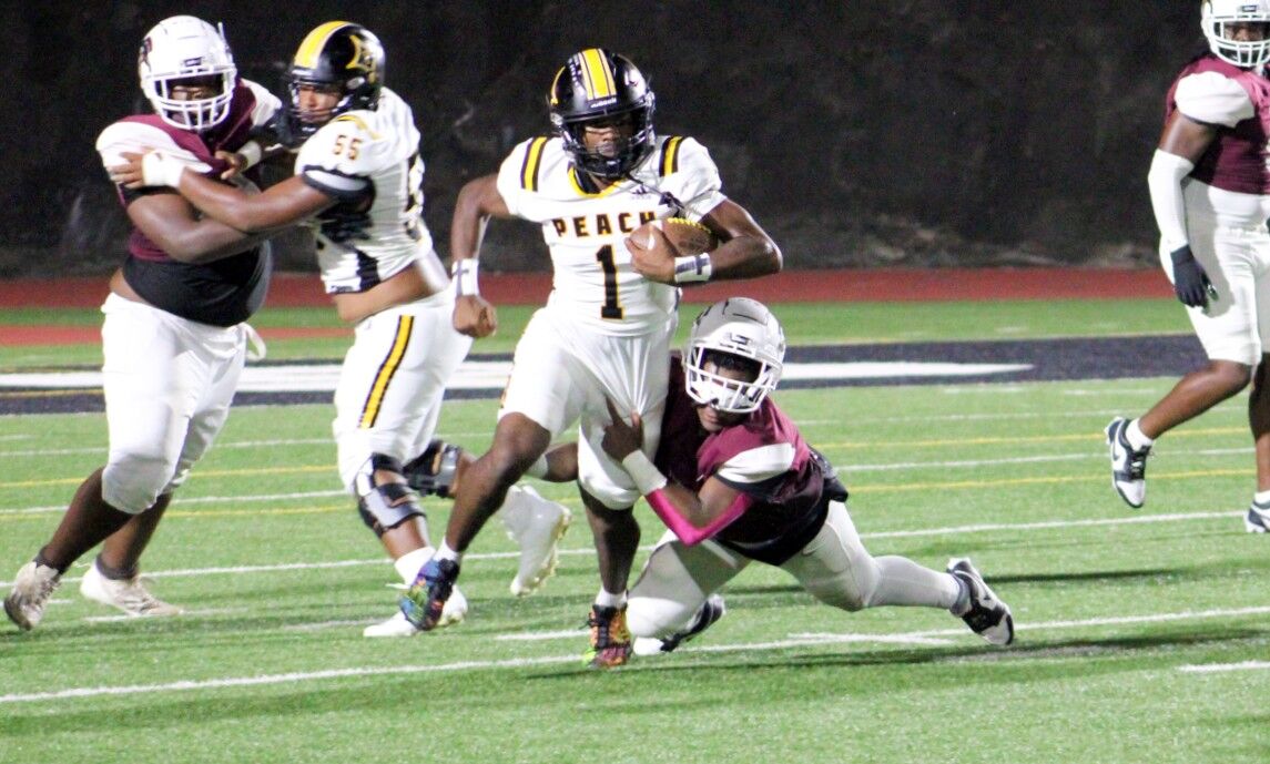 PHOTOS: Peach County football runs over Dougherty – Albany Herald